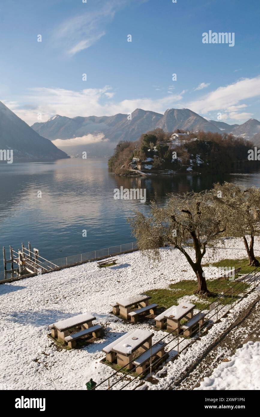 Lake Como with snow in Ossuccio with Isola Comacina in the background ...