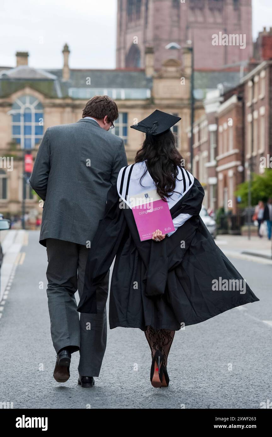 Liverpool University Graduation students in traditional cap and gown ...