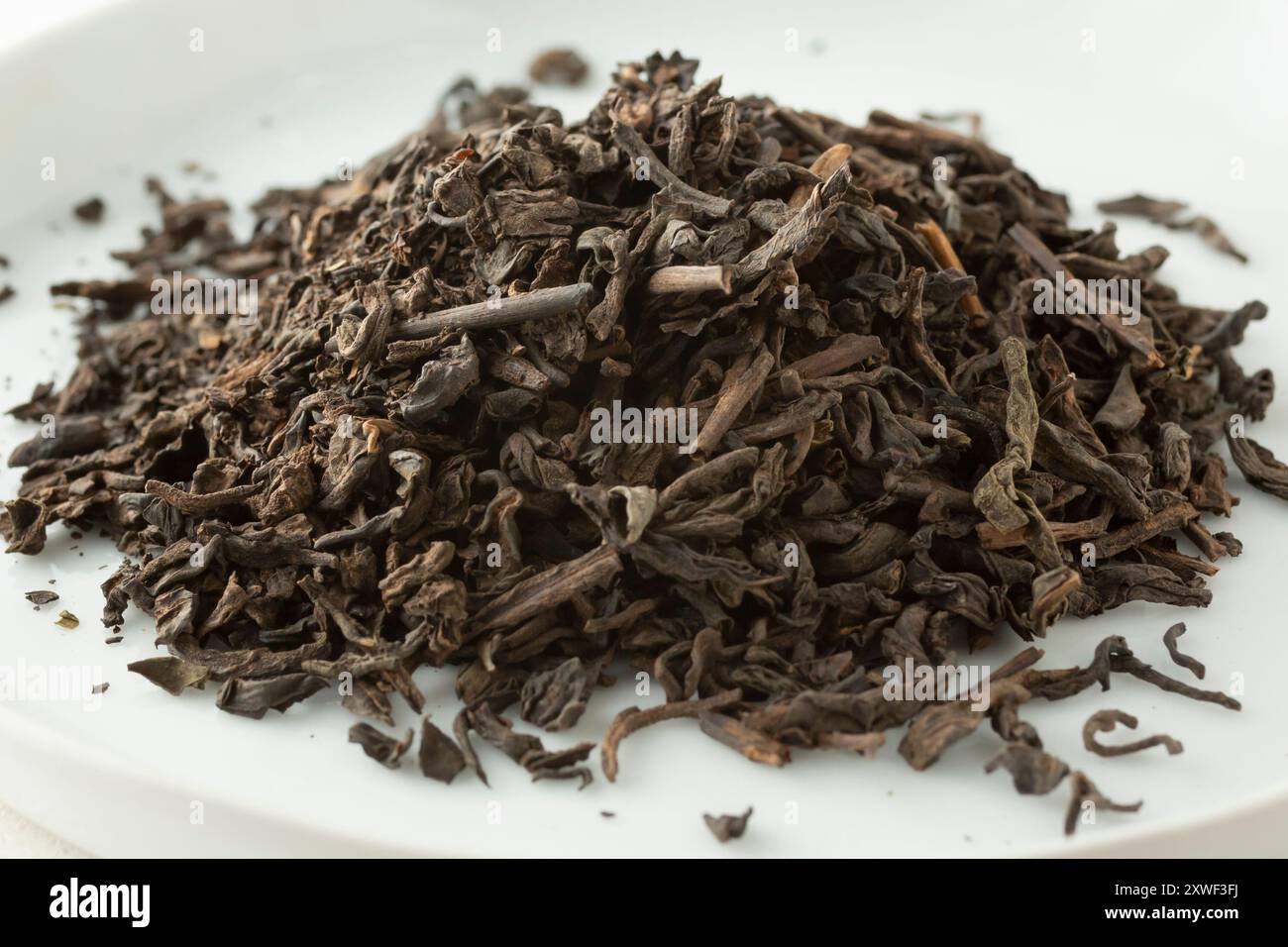 A view of of a pile of loose leaf pu-erh tea Stock Photo - Alamy