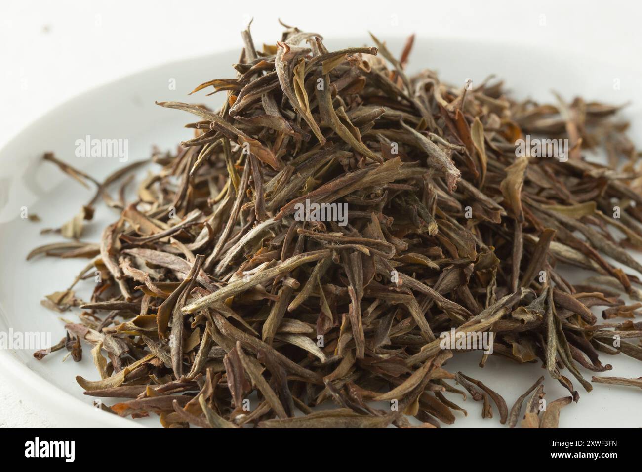 A view of a pile of huoshan huangya yellow tea Stock Photo - Alamy
