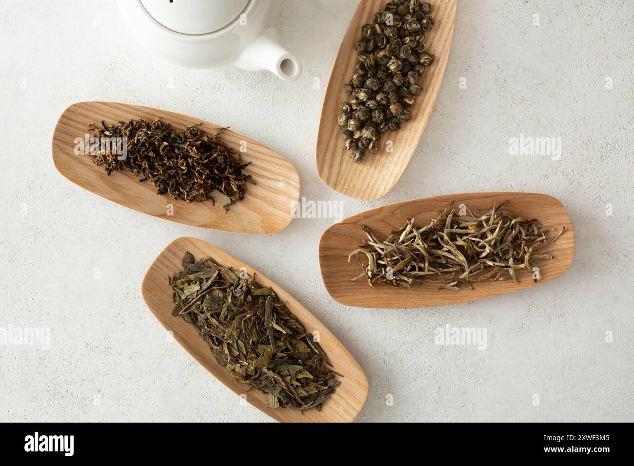 A top down view of various loose leaf teas on bamboo plates Stock Photo ...