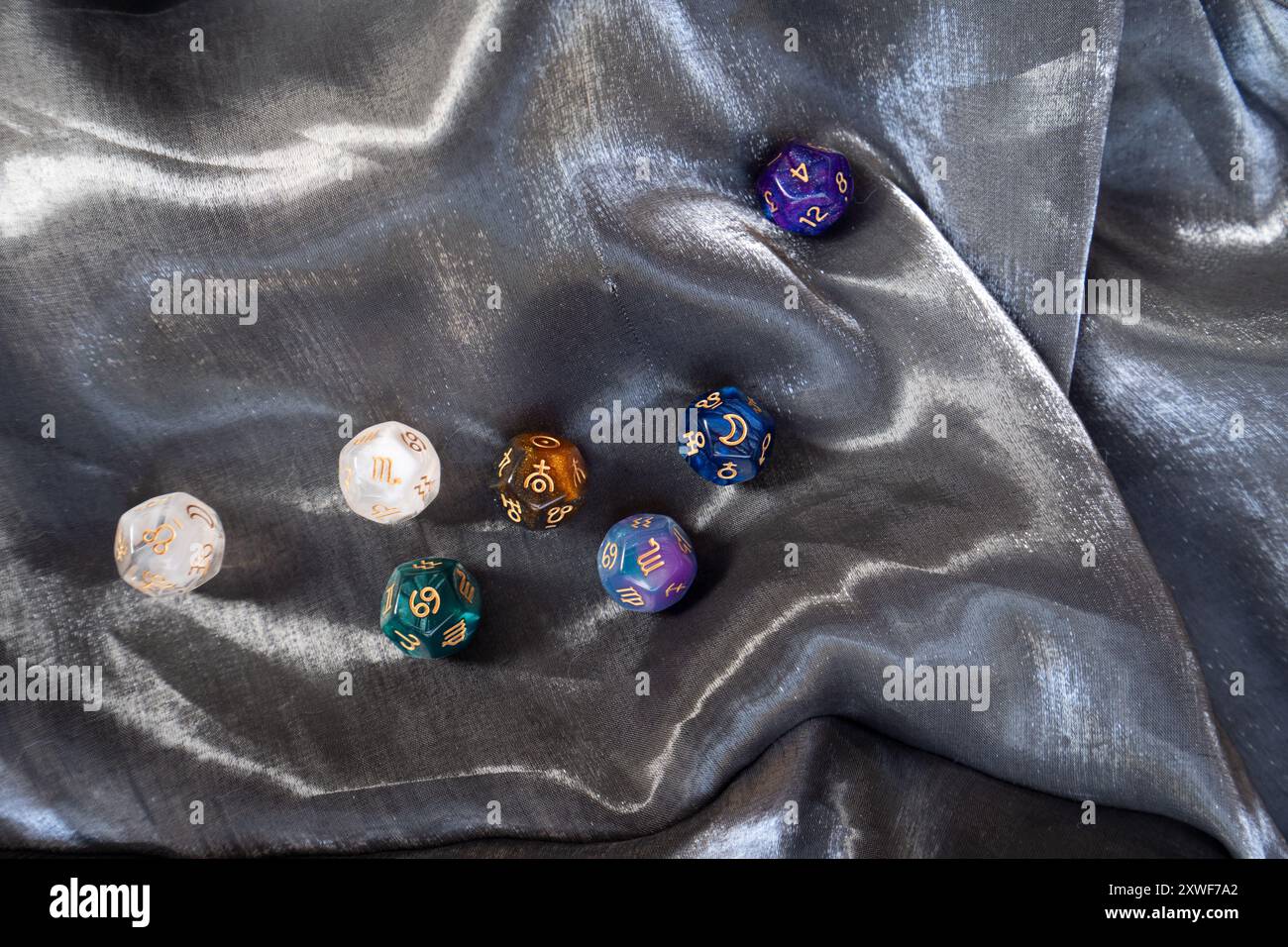 Zodiac horoscope with divination dice Stock Photo - Alamy