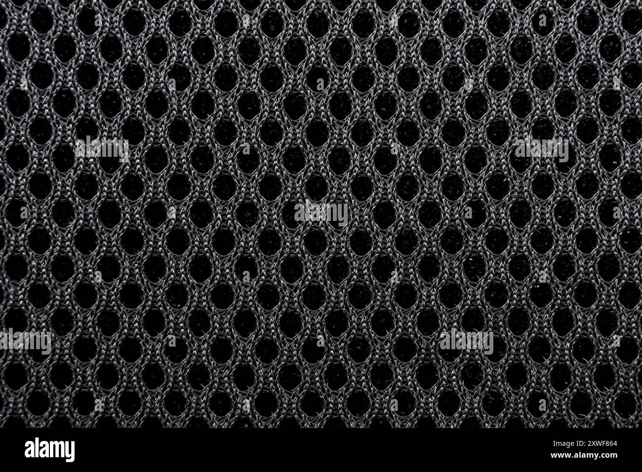 Texture of mesh nylon fabric in black color. Carbon fabric Stock Photo ...