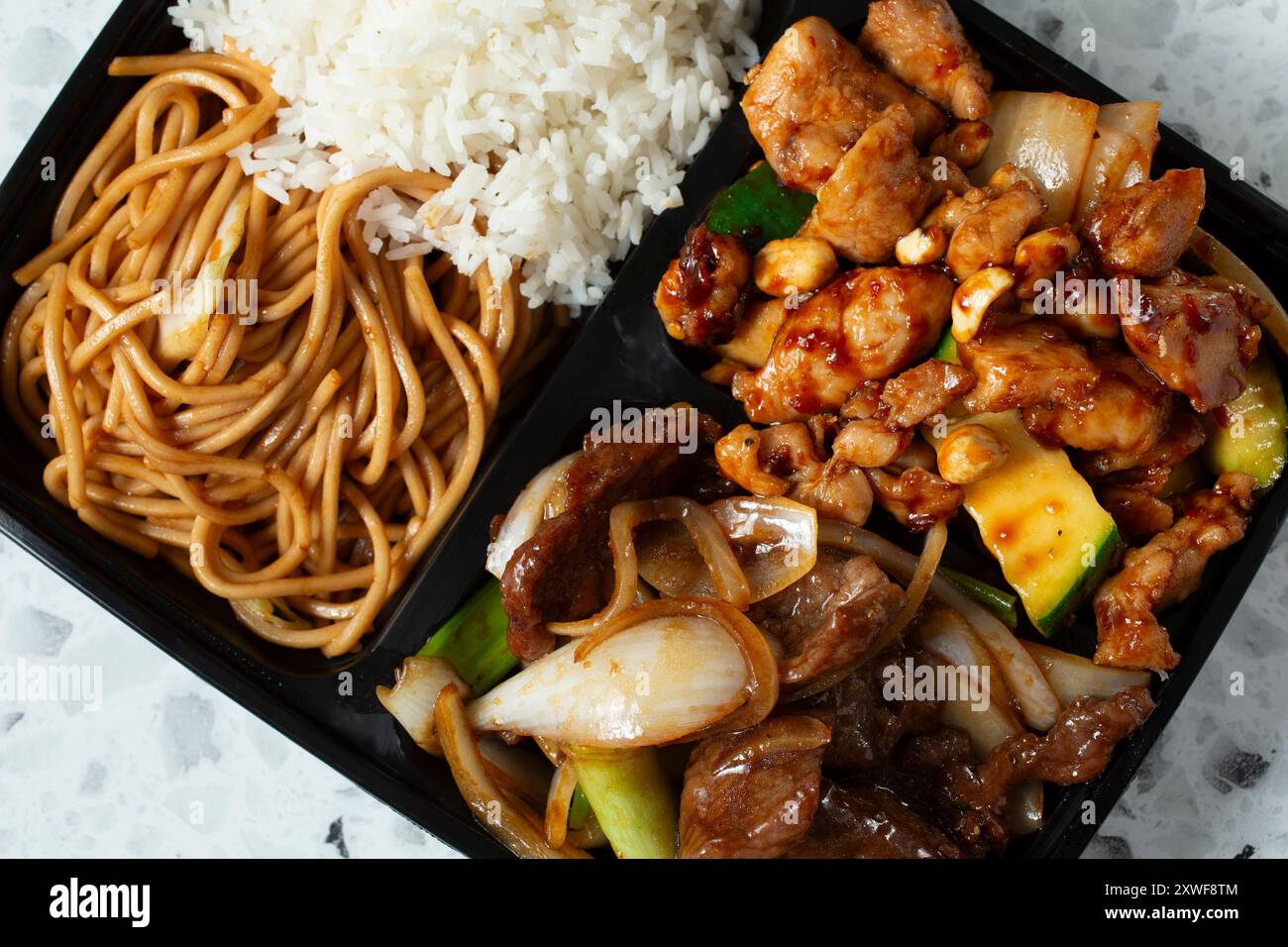 A top down view of a 2-item combo, featuring Mongolian beef and kung ...