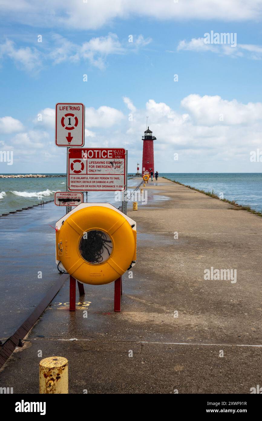 People walking by the Kenosha lighthouse in Kenosha, Wisconsin USA ...