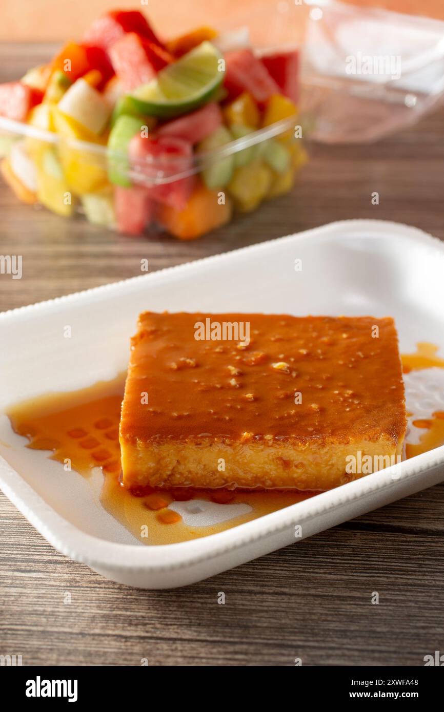 A view of a square slice of flan Stock Photo - Alamy