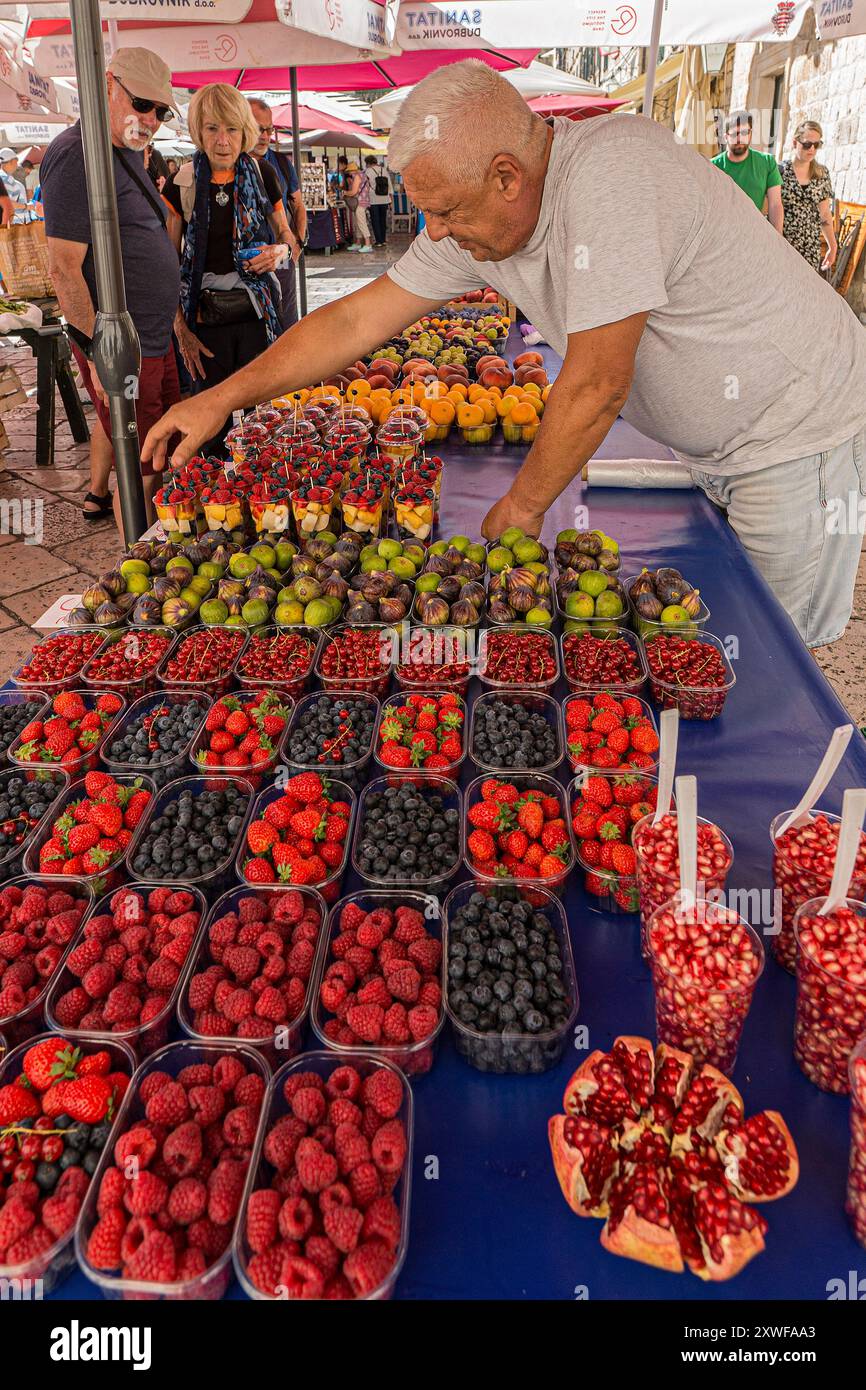 Market trader in Dubrovnik selling his lovely fresh fruit Stock Photo ...