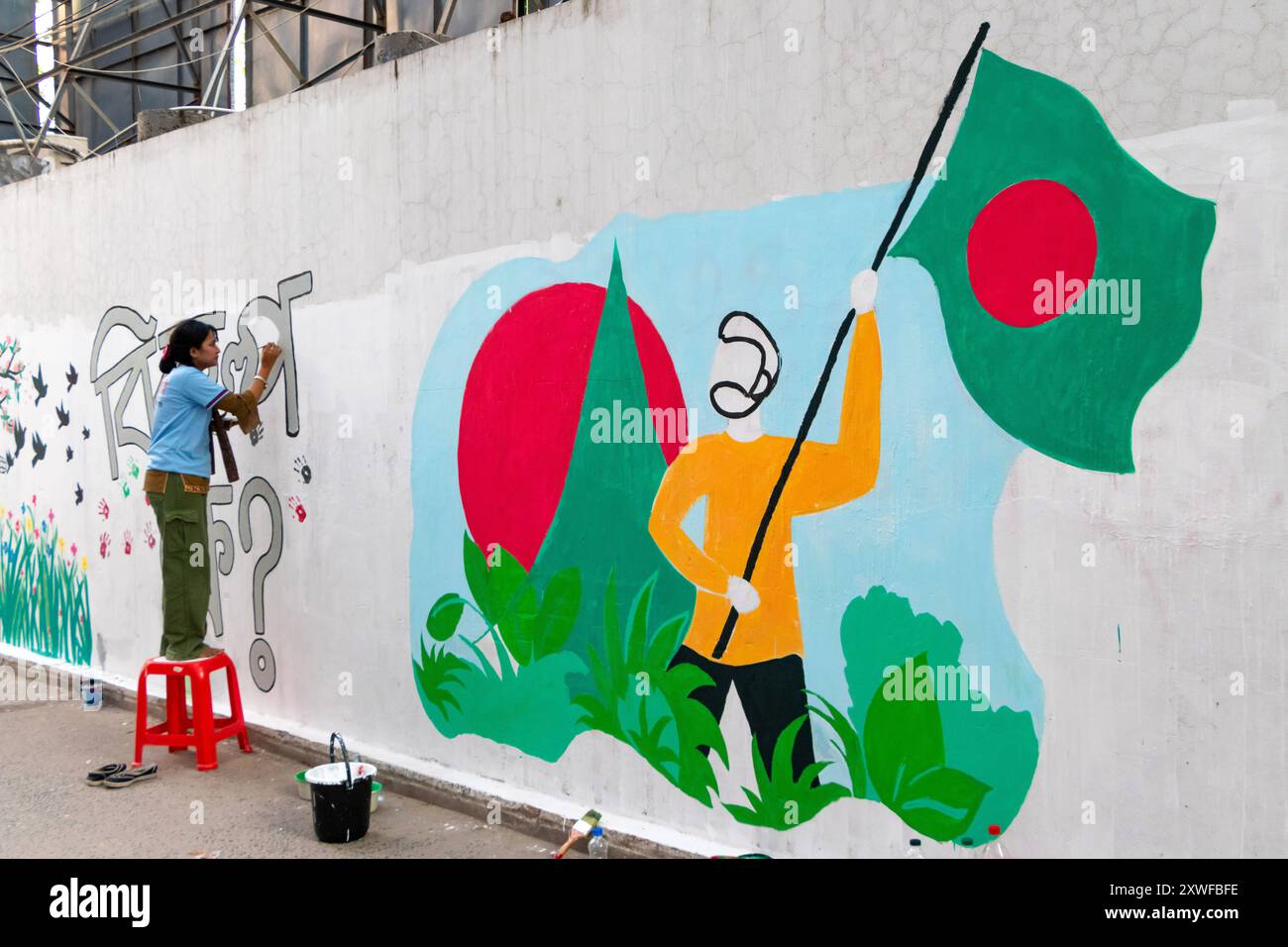 Narayanganj, Dhaka, Bangladesh. 19th Aug, 2024. Students paint graffiti ...