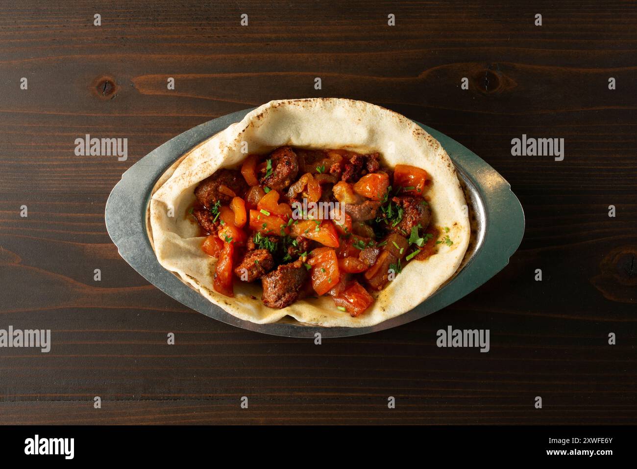 A top down view of a plate of soujouk salad Stock Photo - Alamy