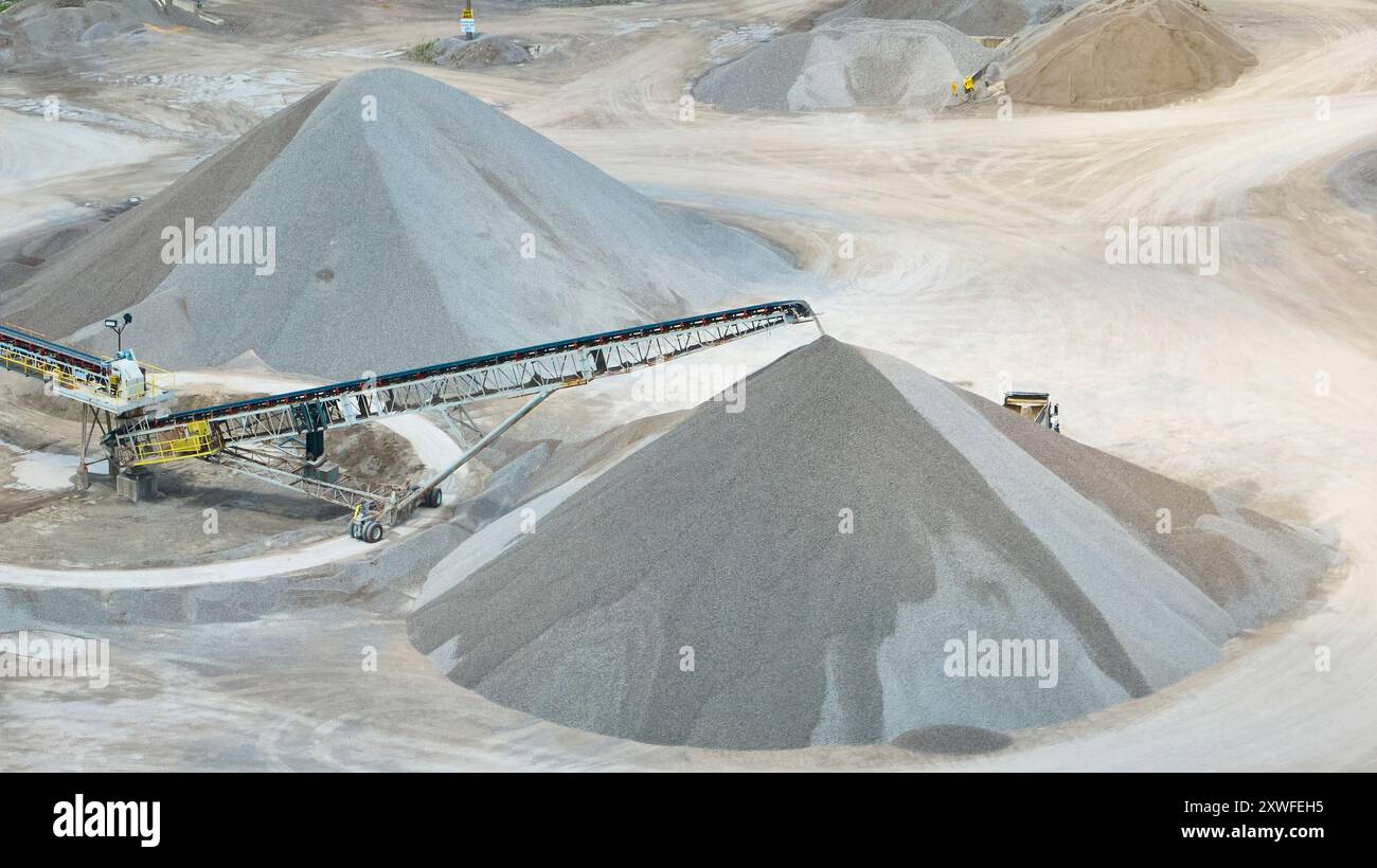 Aerial Quarry Conveyor System and Gravel Piles Stock Photo - Alamy