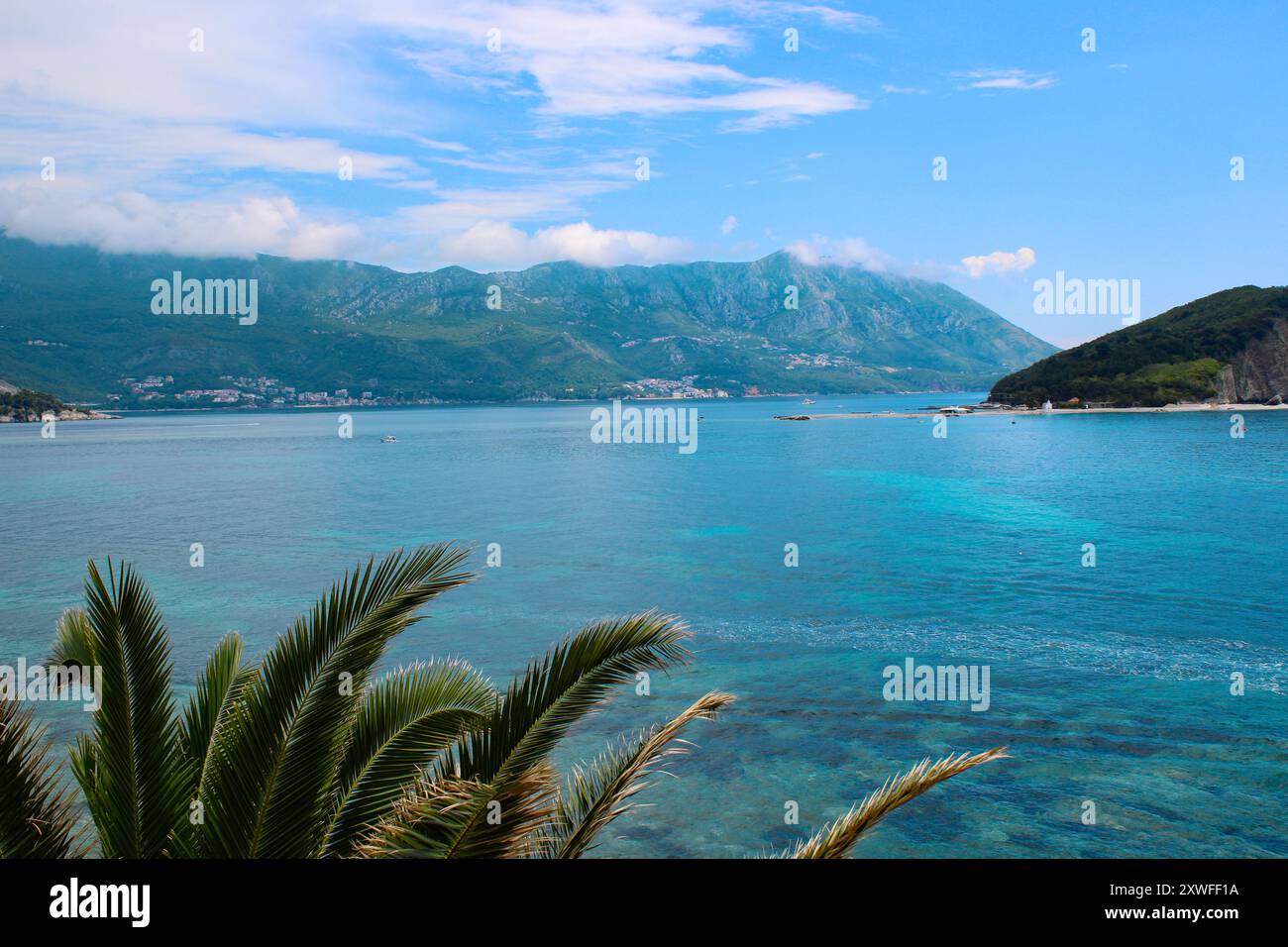 Vivid scenic photo of Budva bay. Clear blue water, exotic islands ...
