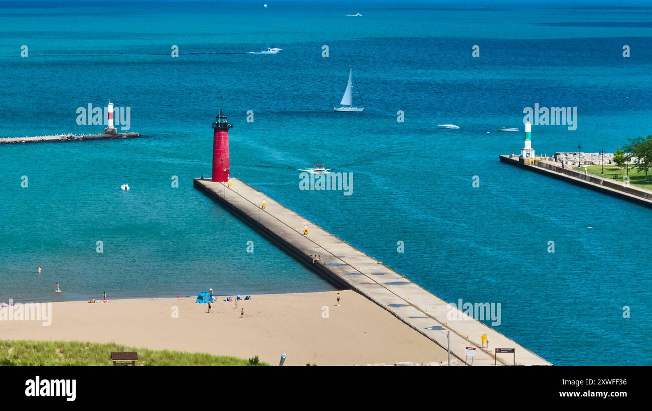 Aerial Fly Over Three Lighthouses and Sandy Beach on Lake Michigan ...