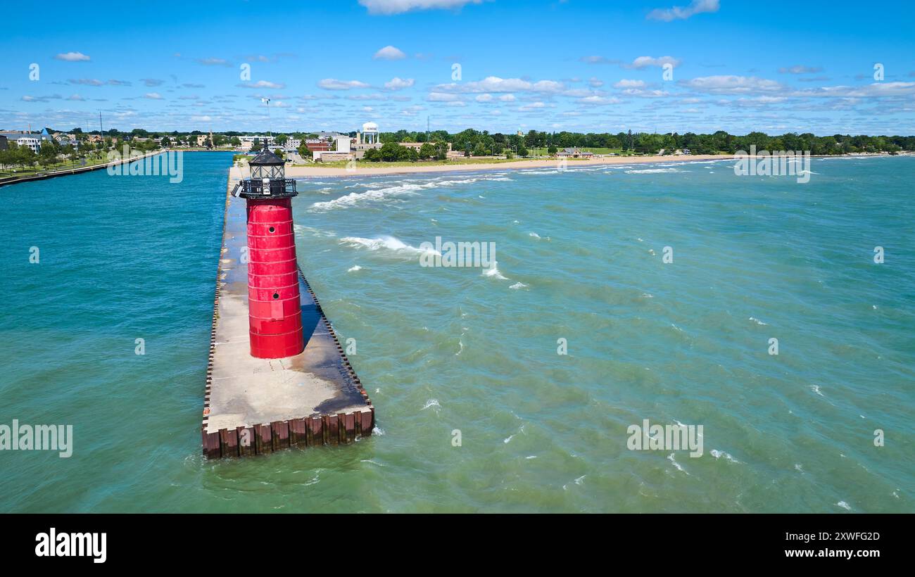 Aerial Fly Over Red Lighthouse Pier on Lake Michigan Stock Photo - Alamy