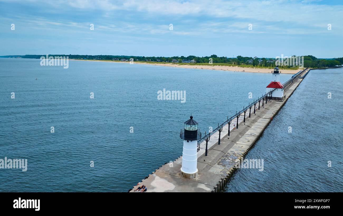 Aerial View of Twin Lighthouses on North Pier in Serene Coastal Setting ...
