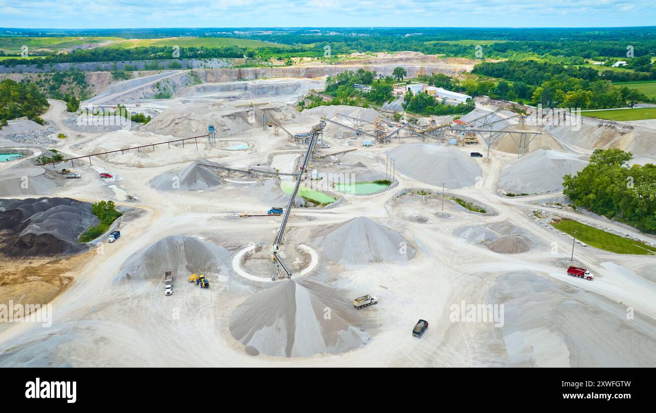 Aerial Quarry Mining Operation with Machinery and Aggregate Piles Stock ...