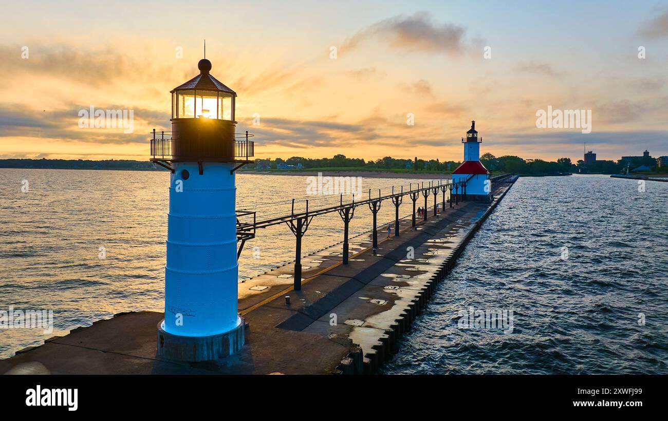 Aerial View of Two Lighthouses on Pier at Sunset Stock Photo - Alamy