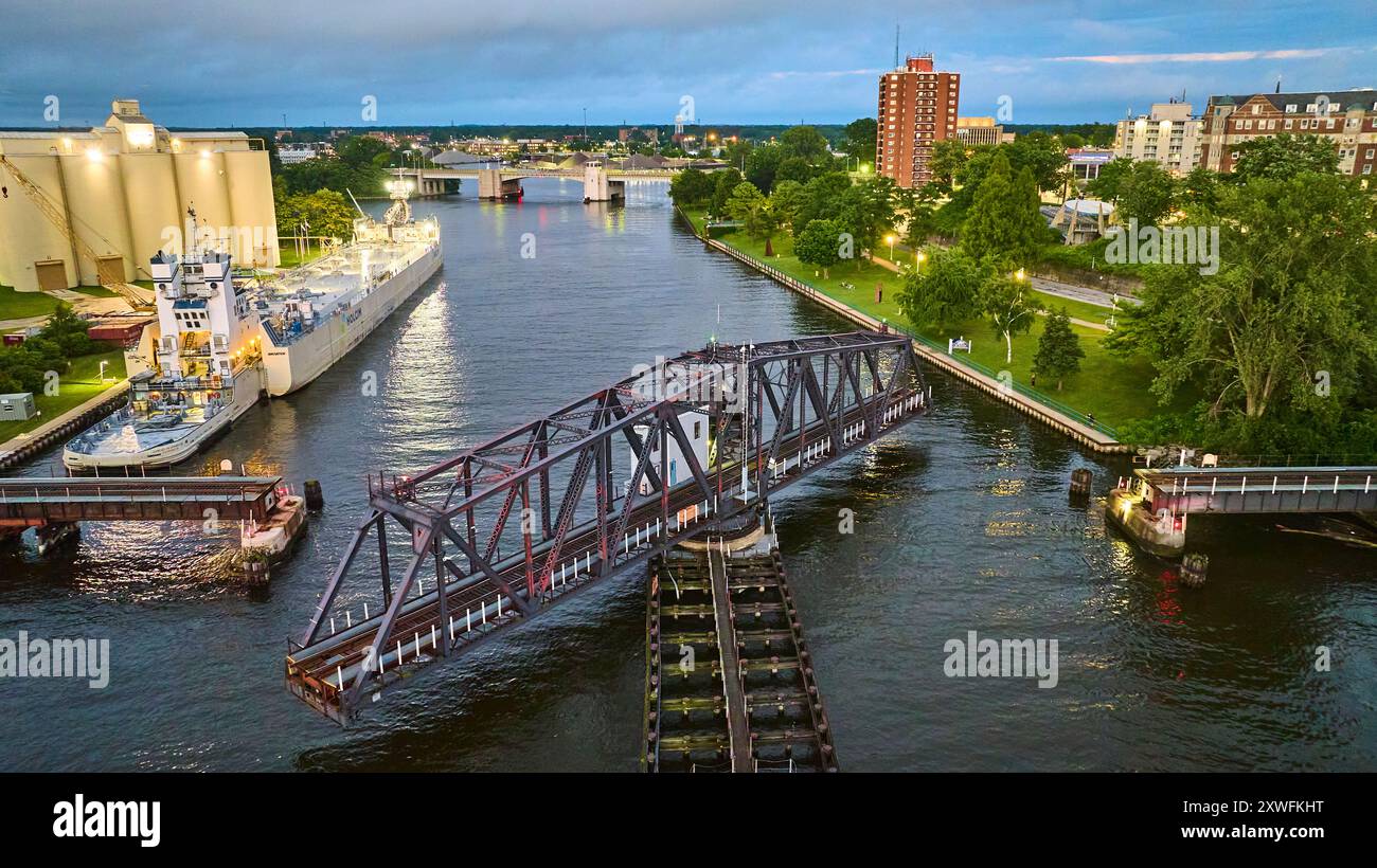 Aerial View of Cargo Ship Grain Silo and Railway Bridge at Twilight ...