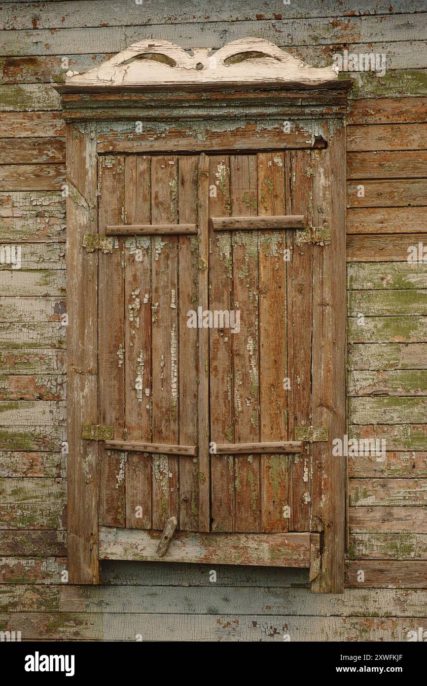 The shuttered window of an old wooden house Stock Photo - Alamy