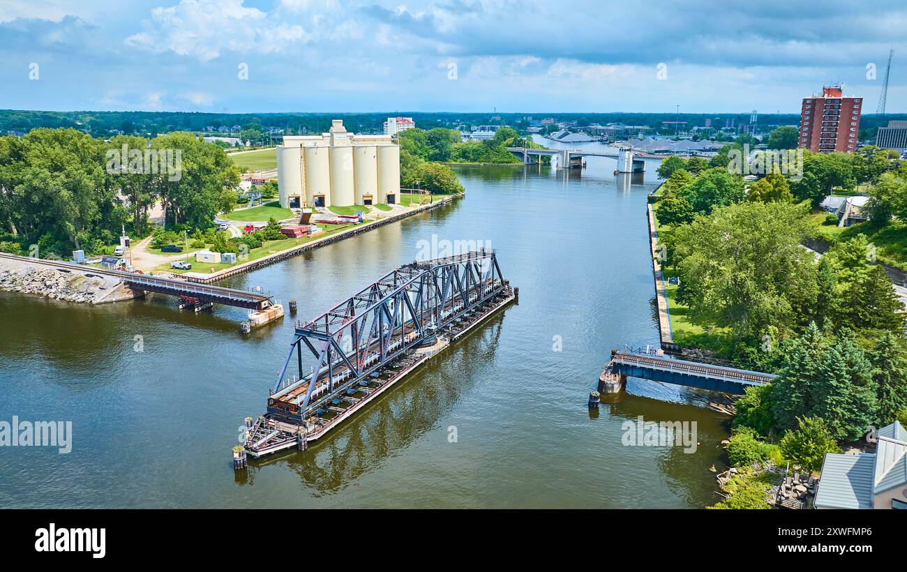Aerial Fly Over Swing Bridge and Silos by St. Joseph River Stock Photo ...