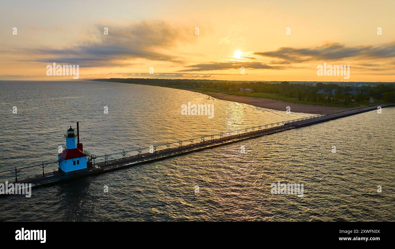 Aerial View of Lighthouse on Pier at Sunset Stock Photo - Alamy