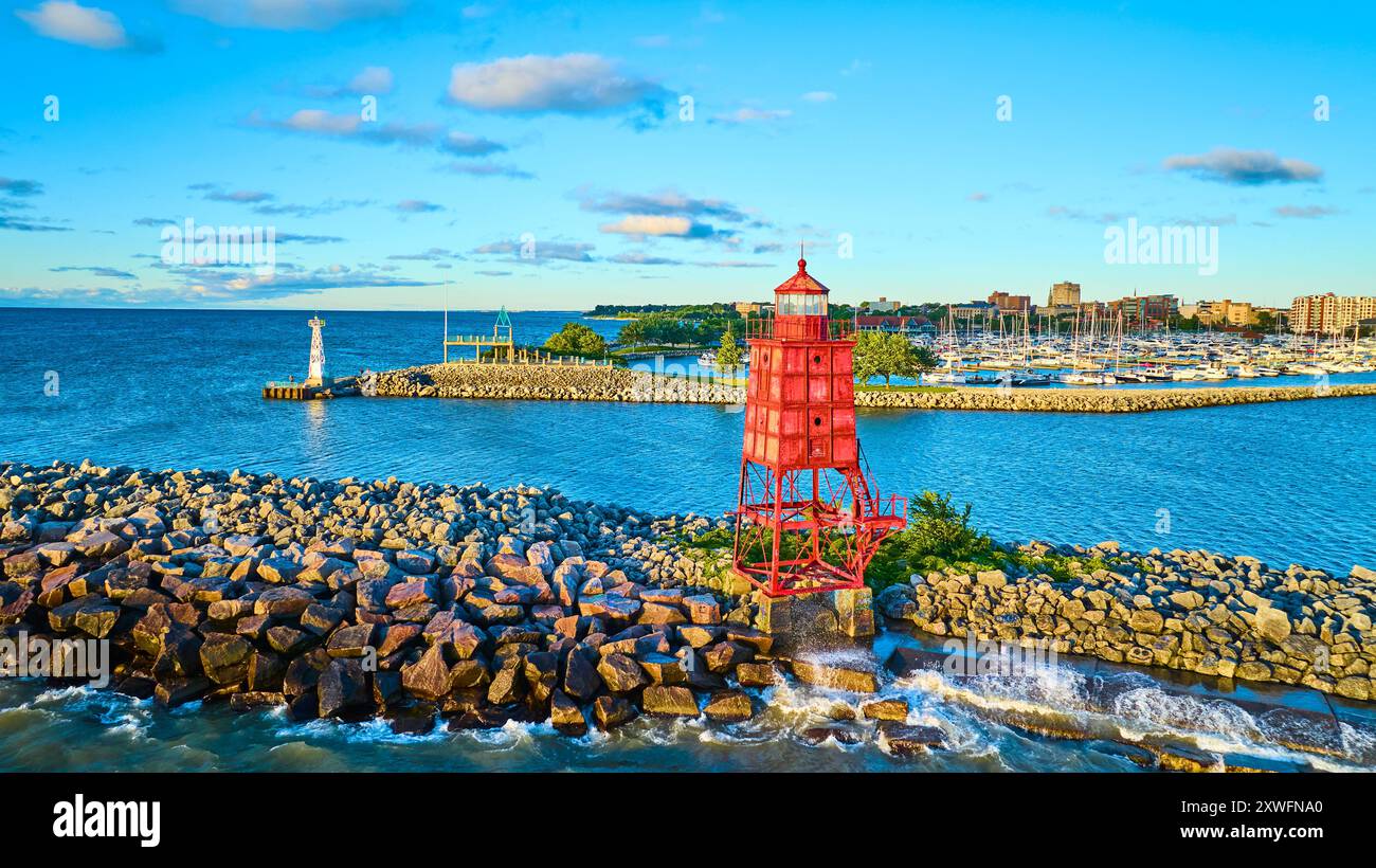 Aerial View of Red Lighthouse and Marina at Golden Hour Stock Photo - Alamy