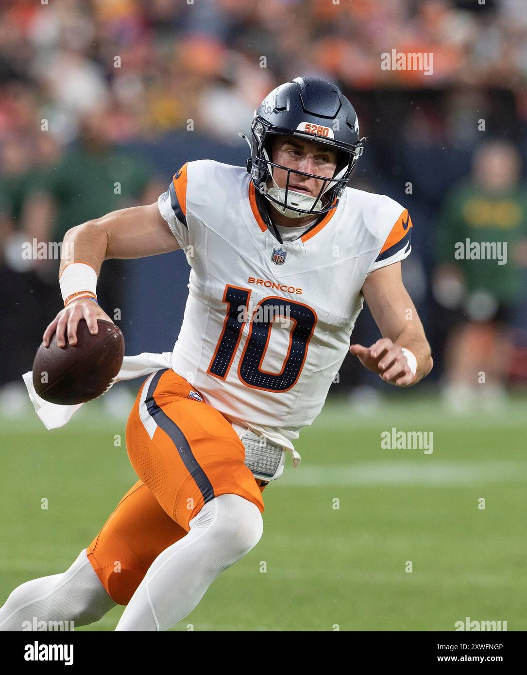 Denver, Colorado, USA. 18th Aug, 2024. Broncos QB BO NIX runs out of ...