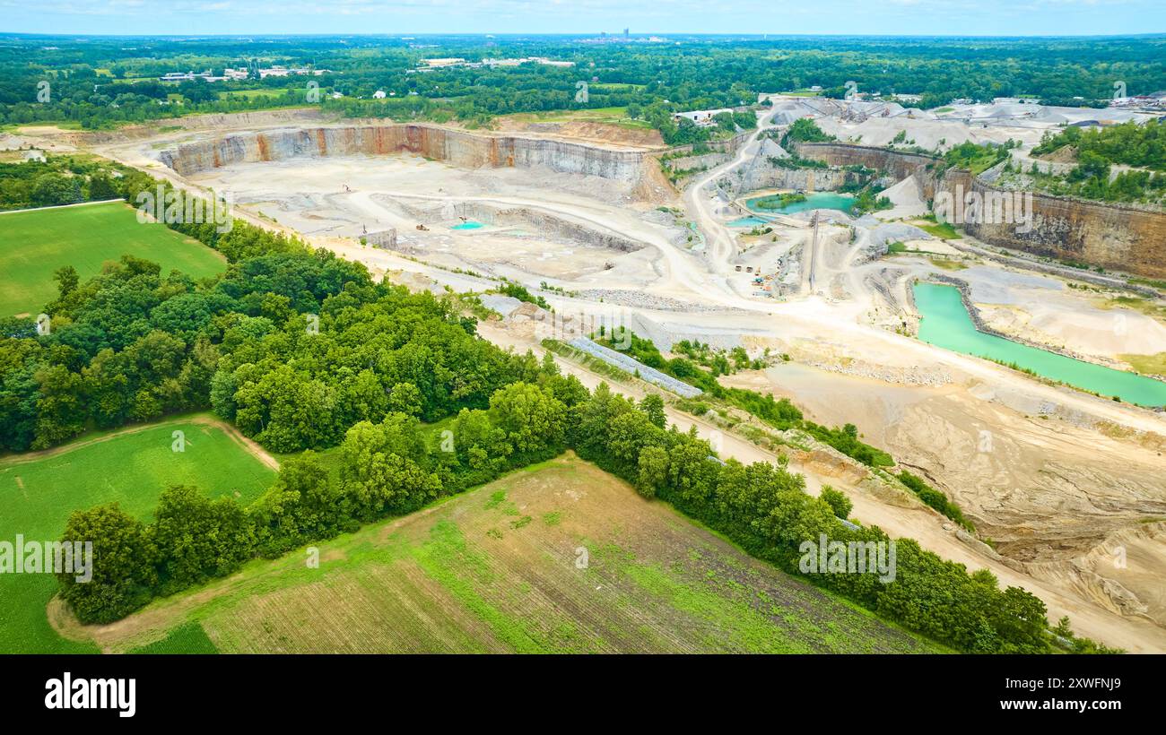 Aerial View of Active Quarry Amidst Green Farmland Stock Photo - Alamy