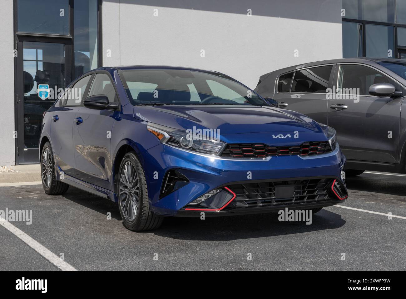 Avon - August 11, 2024: Kia Forte GT-Line display at a dealership. Kia ...