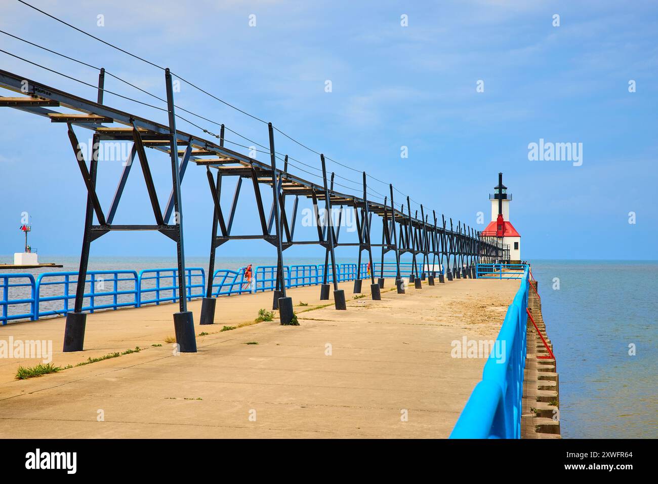 Lighthouse and Pier with Overhead Walkway Perspective Stock Photo - Alamy
