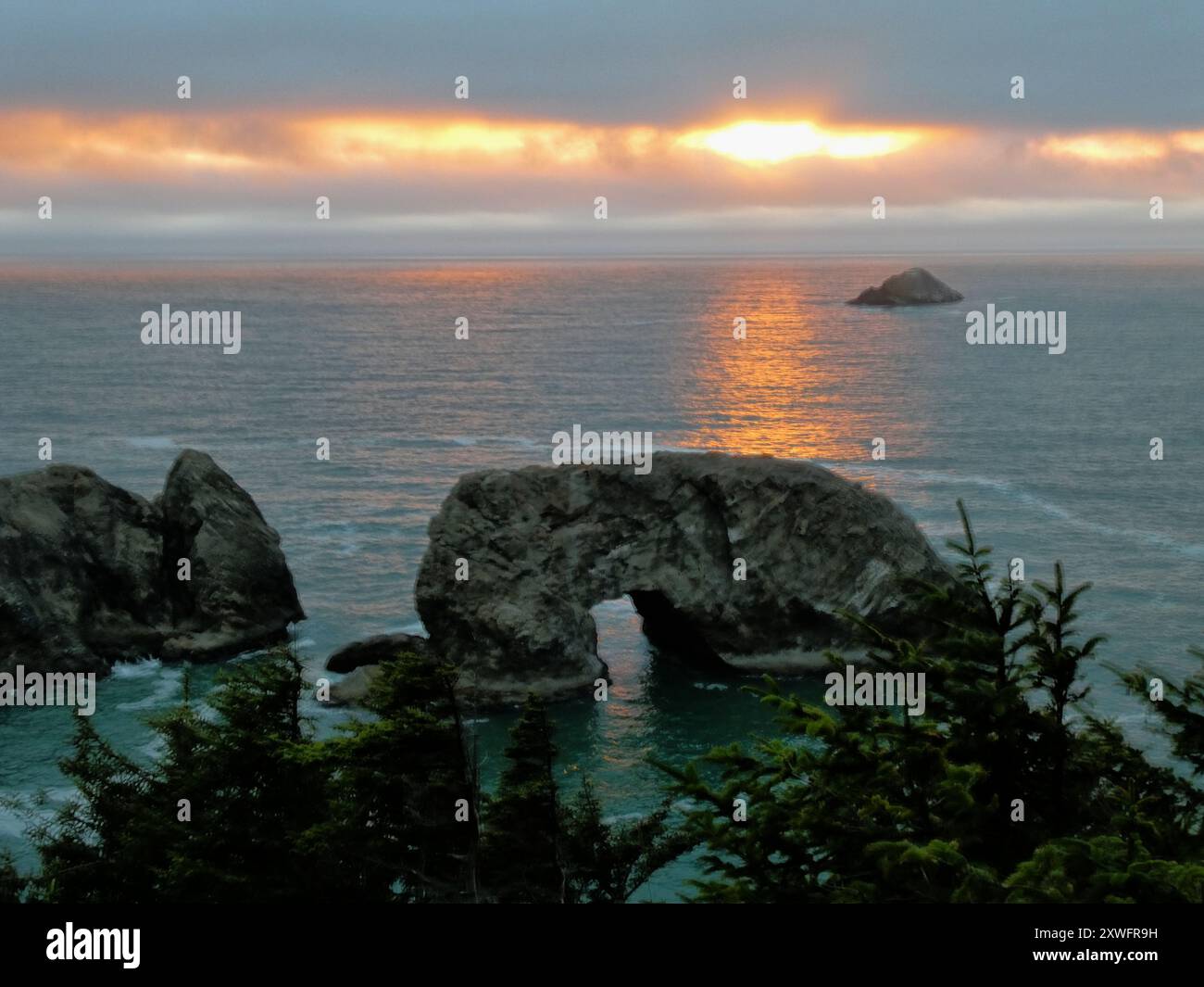 Sunset on Oregon Coast - Brookings. OR, at Arch Rock State Park at ...