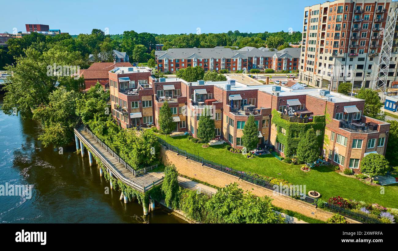 Aerial Fly Through Modern Riverside Townhouses and Riverfront Boardwalk ...