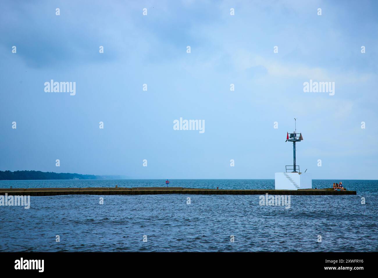 South Pier Lighthouse on Lake Michigan with Calm Waters Perspective ...