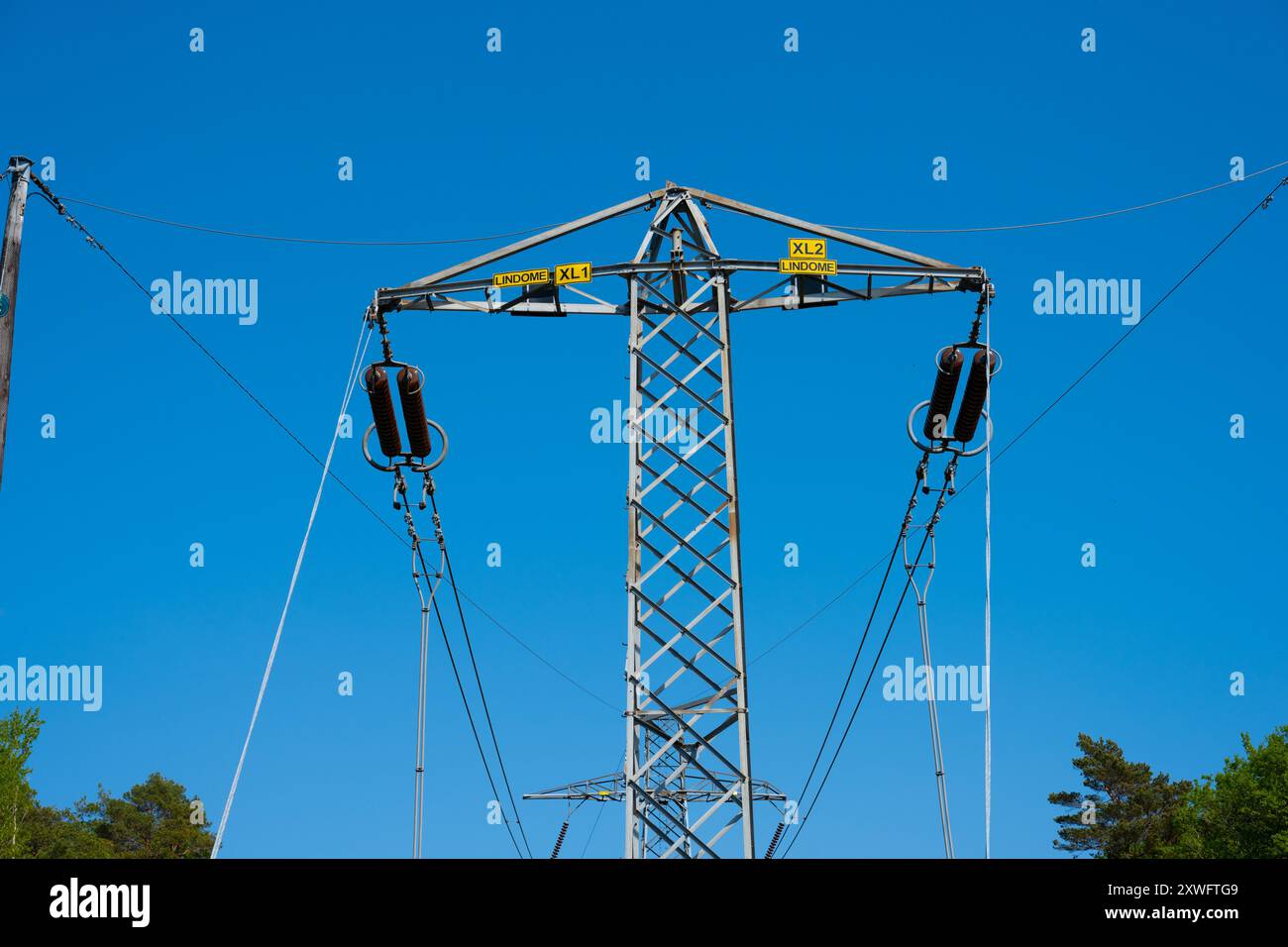 High power lines terminating to a ground station Stock Photo - Alamy