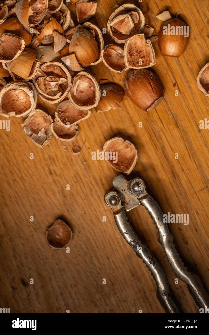 Large pile of hazelnuts with nut cracker Stock Photo - Alamy