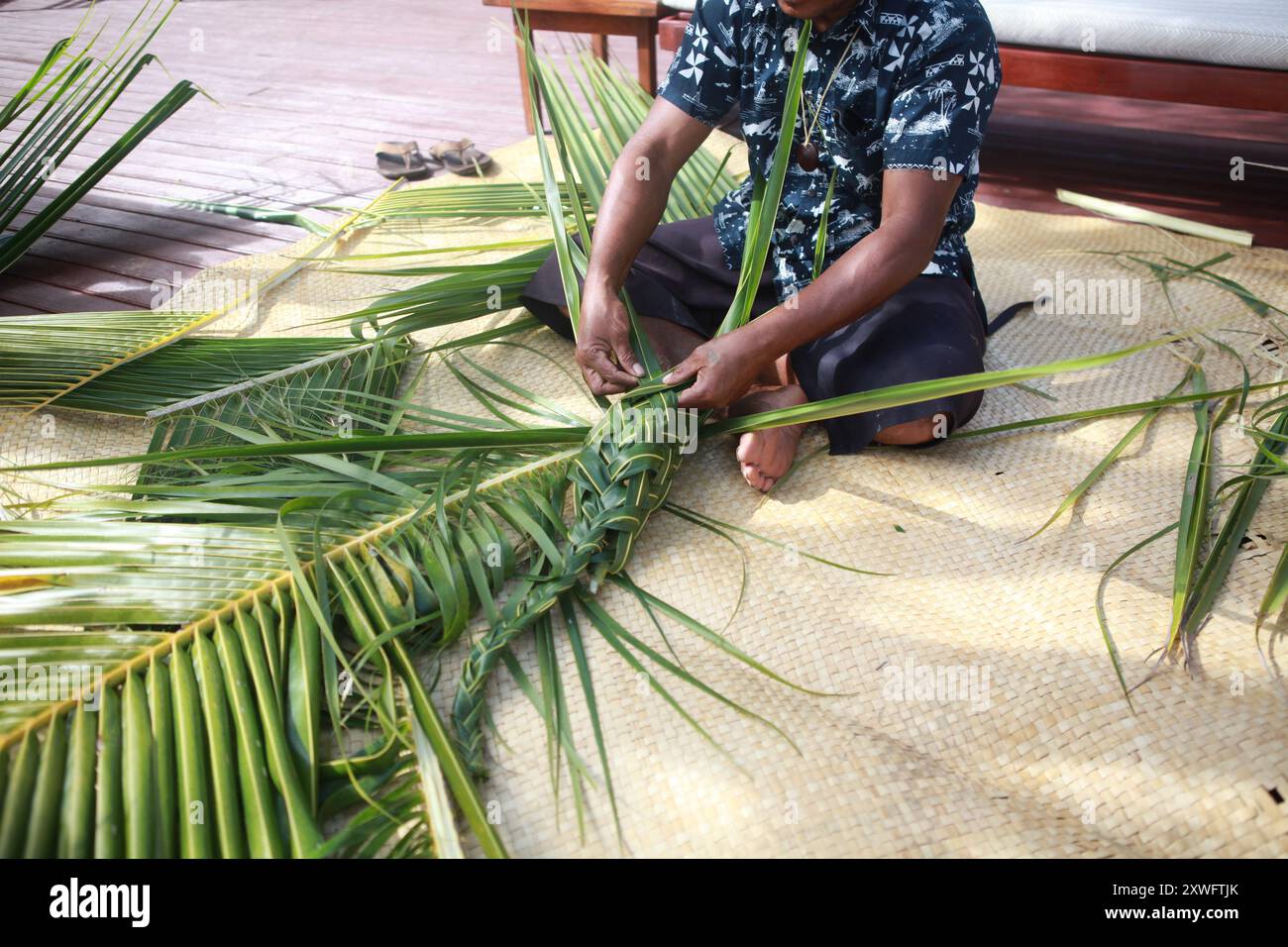 Fijian traditional basket weaving from palm leaves, men's basket ...