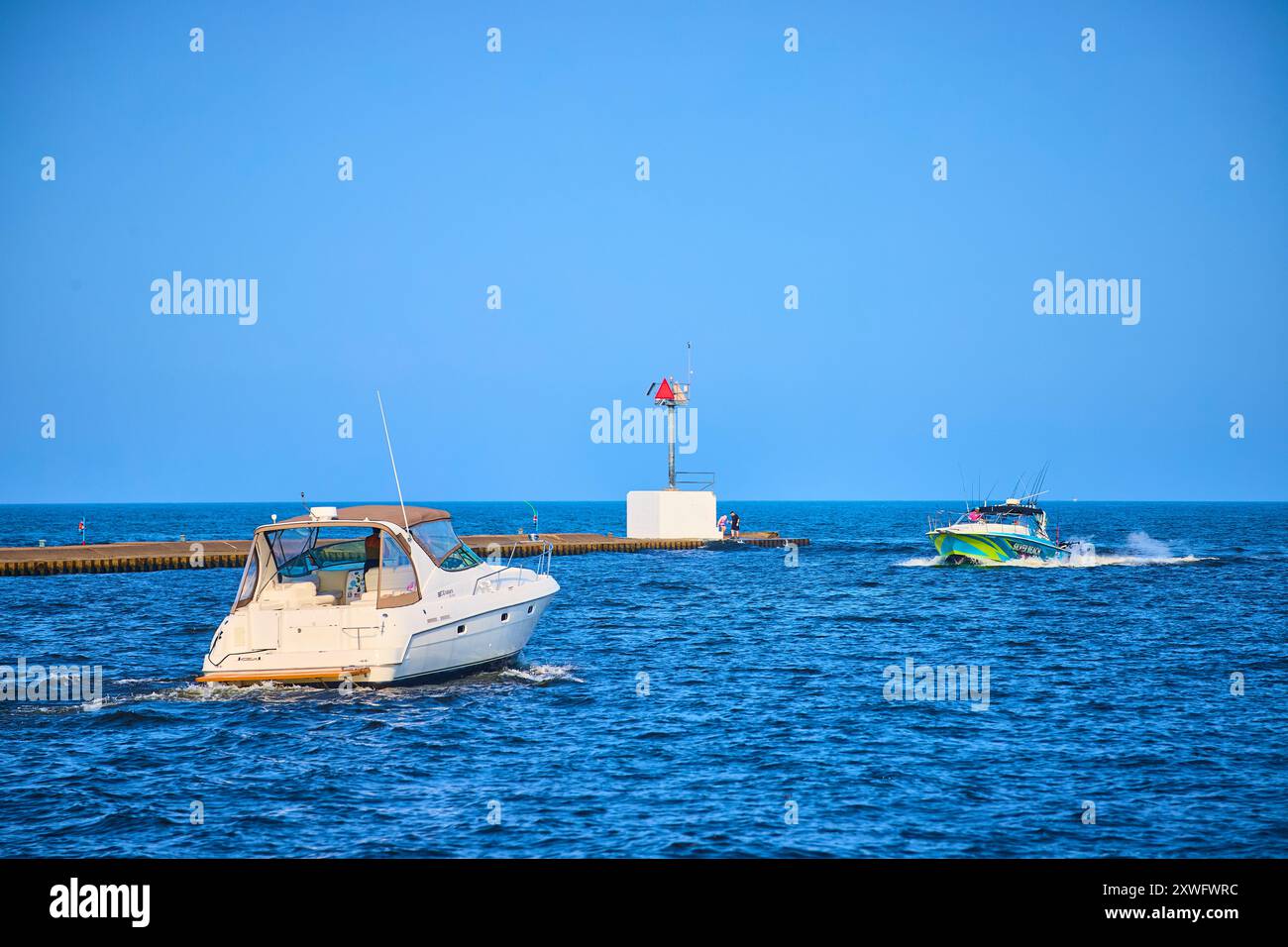 Yacht and Fishing Boat on Calm Lake Michigan Waters Eye Level Stock ...