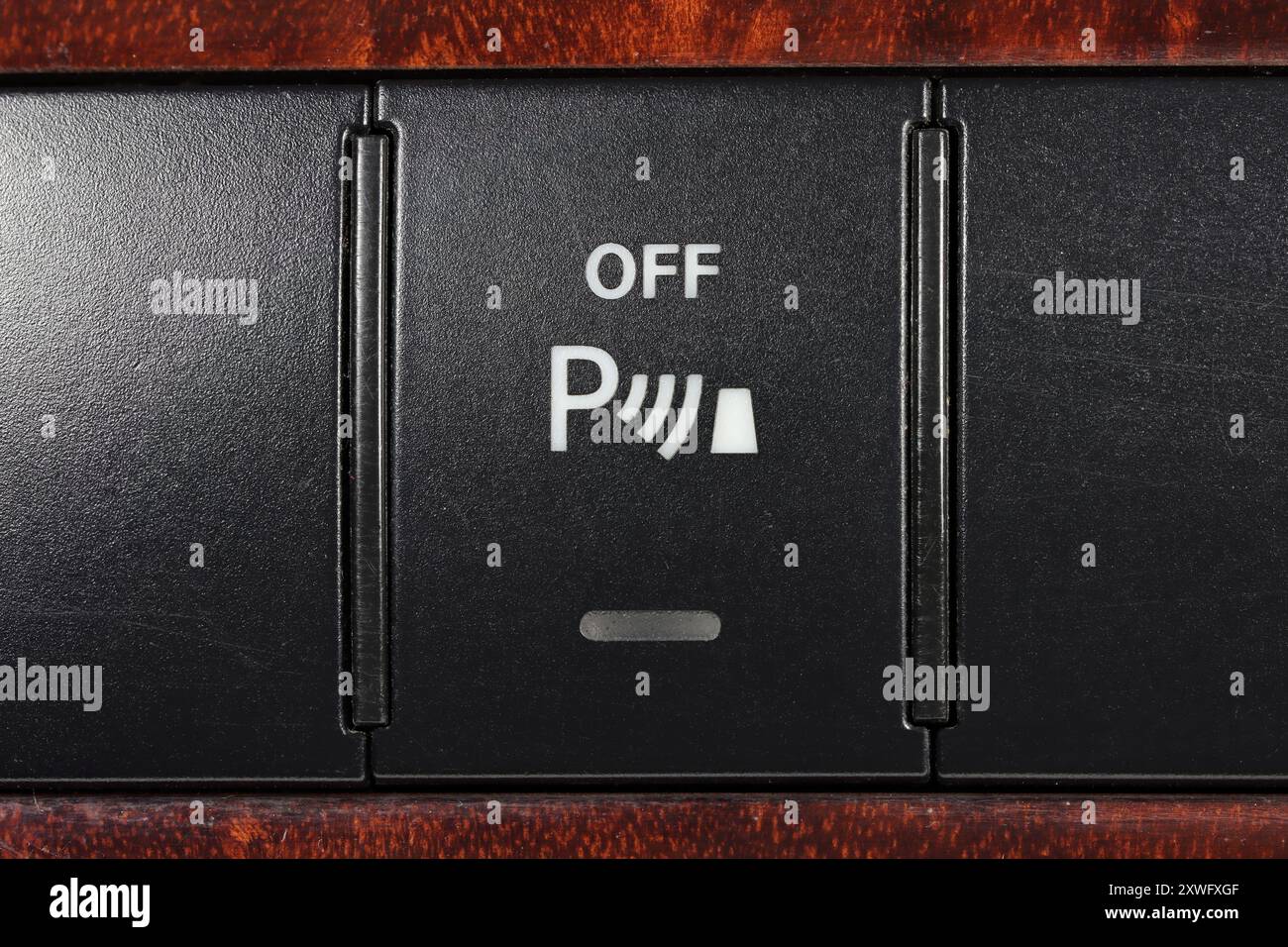 parking sensors deactivation switch inside a used car Stock Photo - Alamy