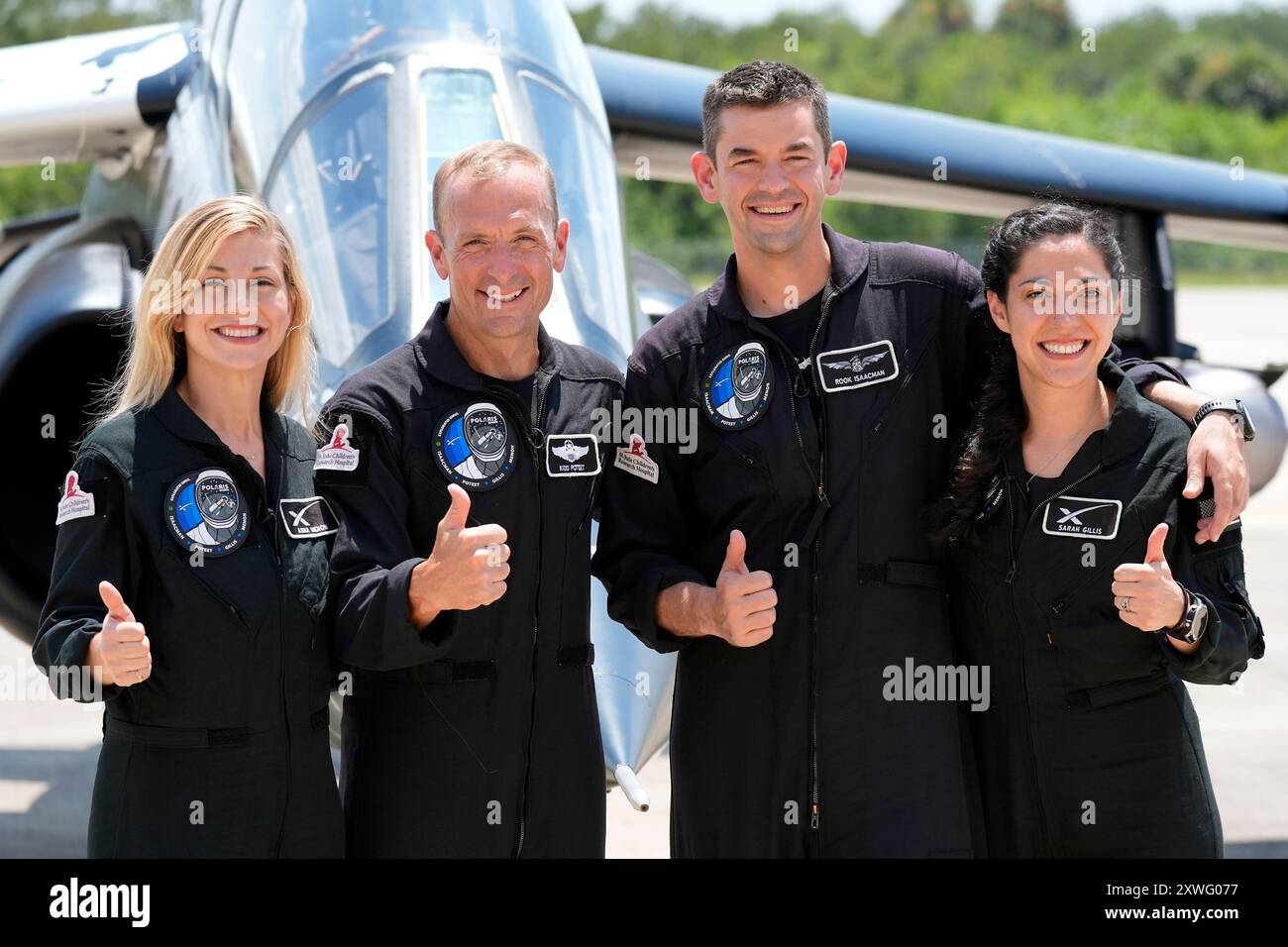 Astronauts from left, mission specialist Anna Menon, pilot Scott Poteet ...