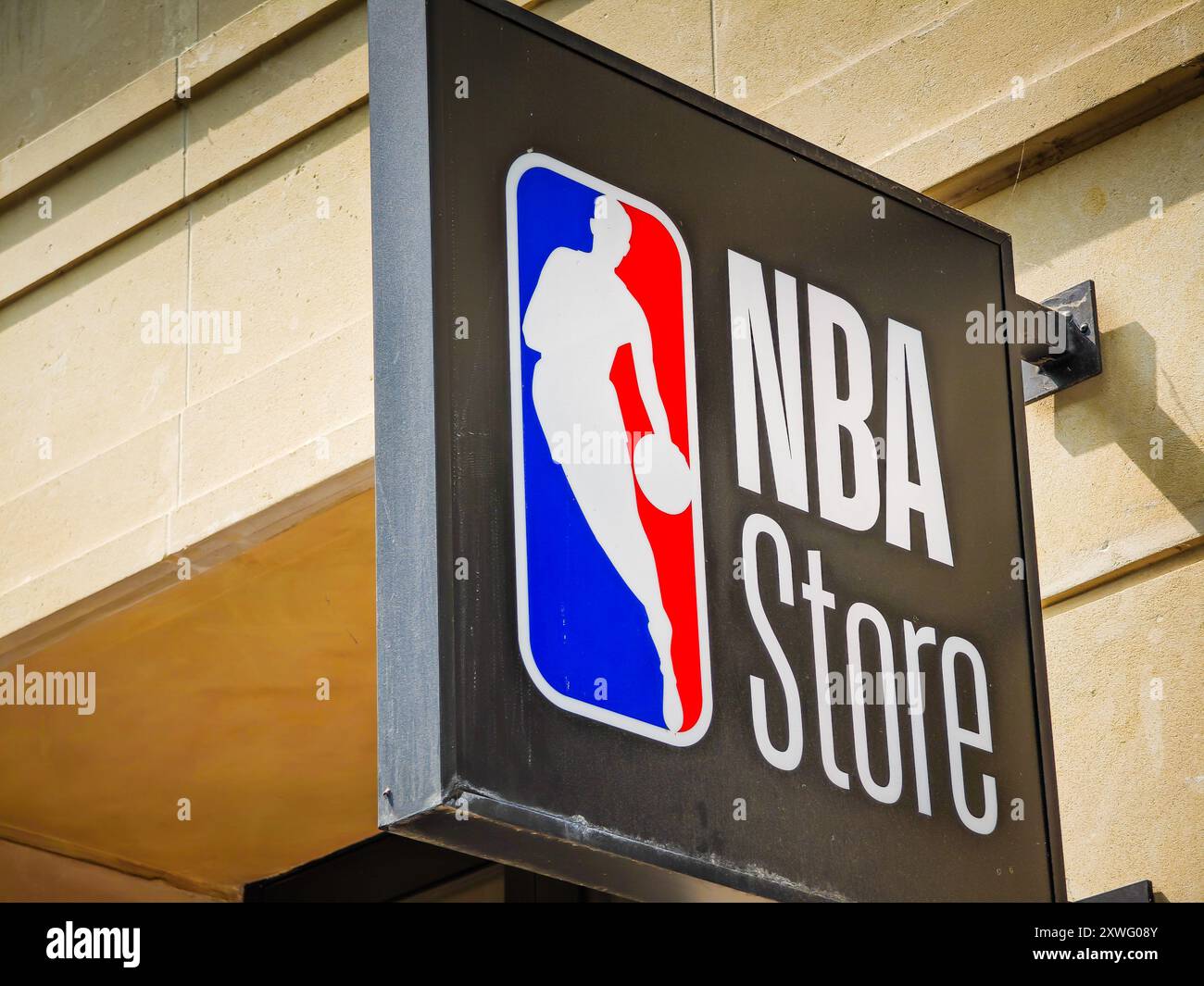 08 19 2024 - Paris, France. NBA store sign with league logo on an old ...