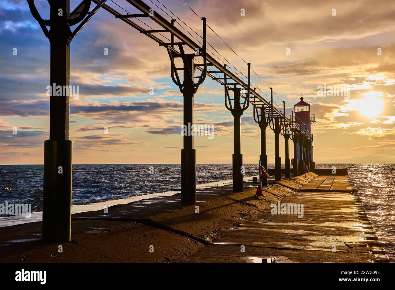 Golden Hour at Benton Harbor Lighthouse Pier Low Perspective Stock ...