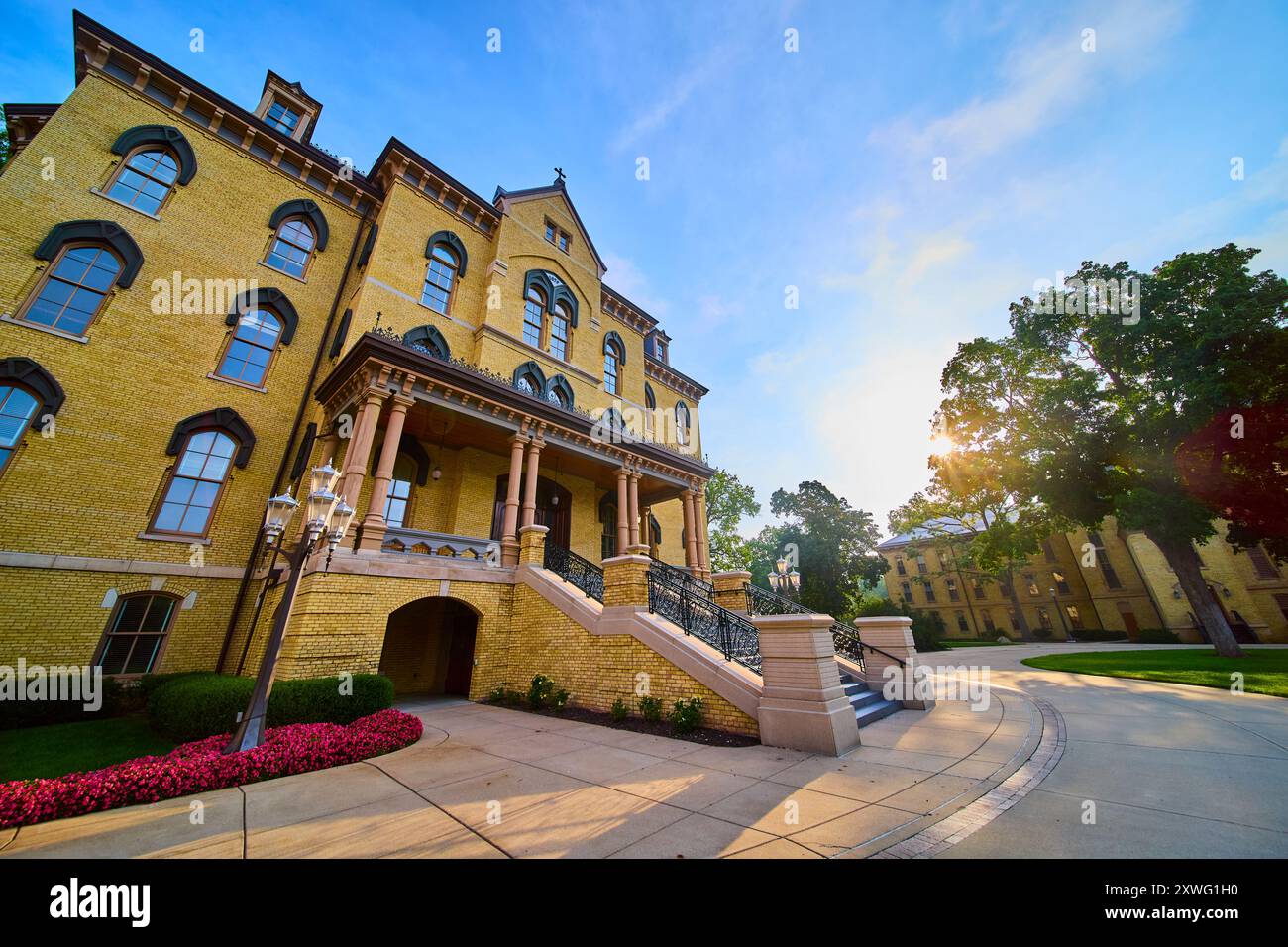 Historic University Building with Arched Windows and Grand Entrance Low ...