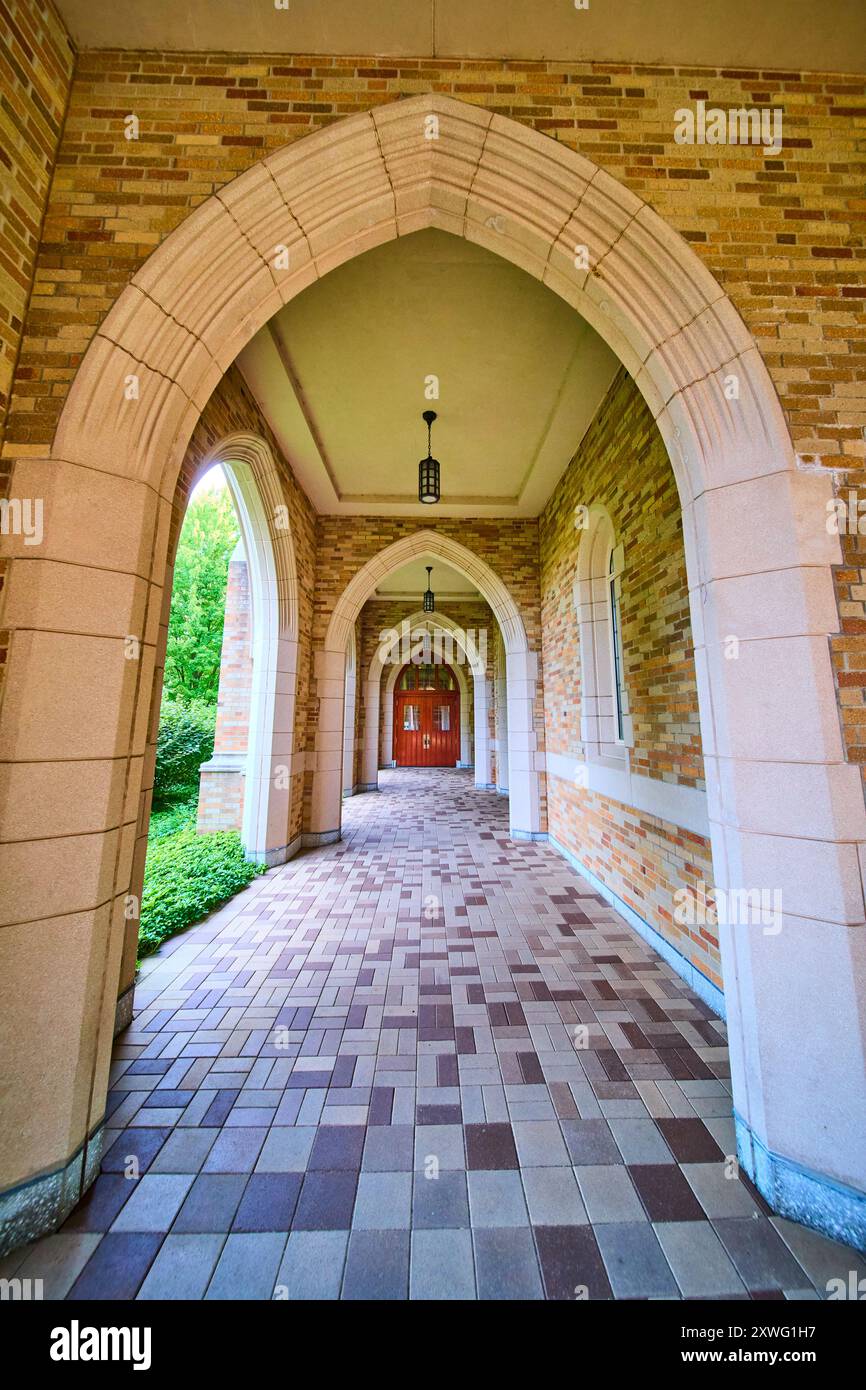 Gothic Arches Corridor with Tile Pathway Leading to Wooden Door Eye ...