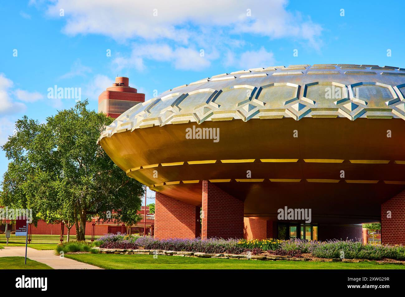 Futuristic Lloyd Wright Dome and Brick Tower in Urban Park Eye-Level Perspective Stock Photo - Alamy