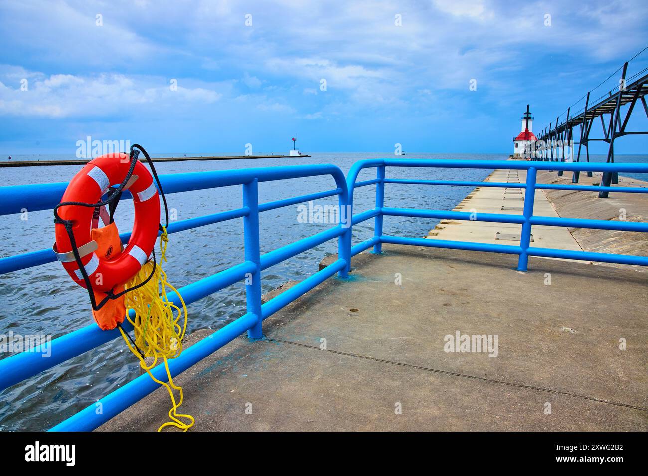 Life Preserver and Lighthouse on Pier, Eye-Level Perspective Stock ...