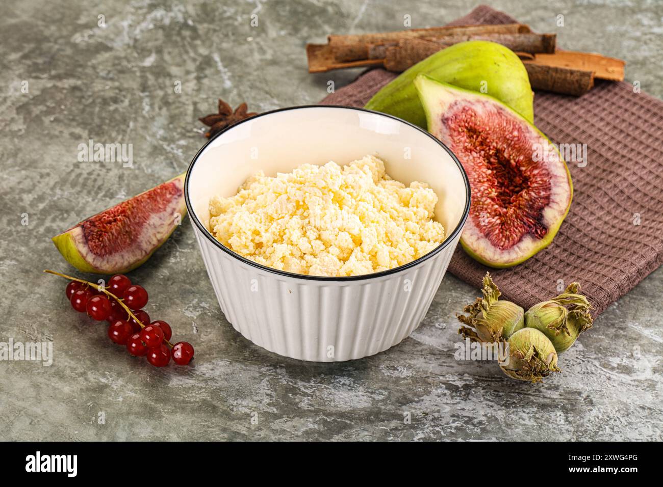 Delicous sheep cottage cheese curd served fig Stock Photo - Alamy