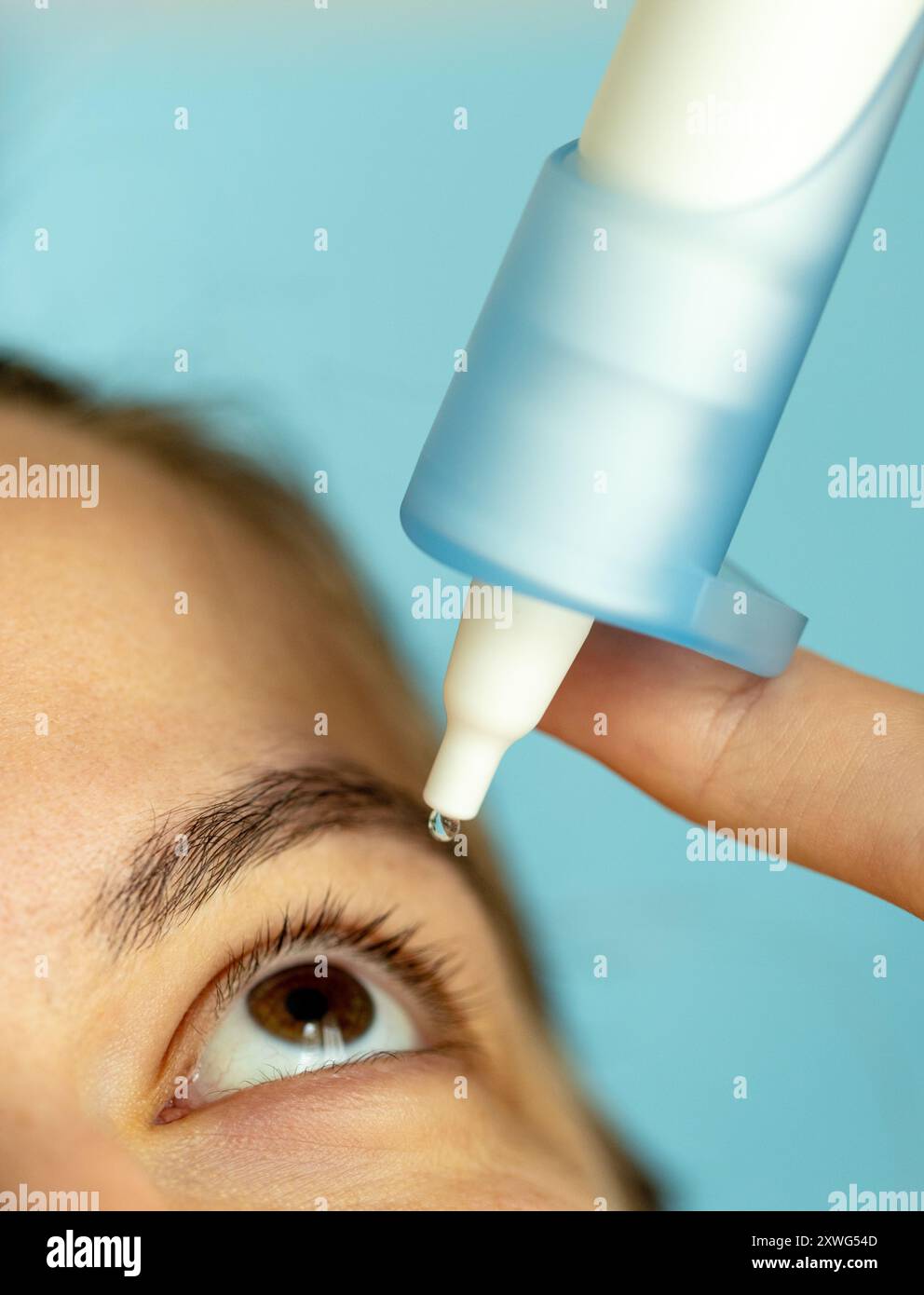 girl uses eye drops to moisturize eyes, tired eyes after work, dry eyes ...