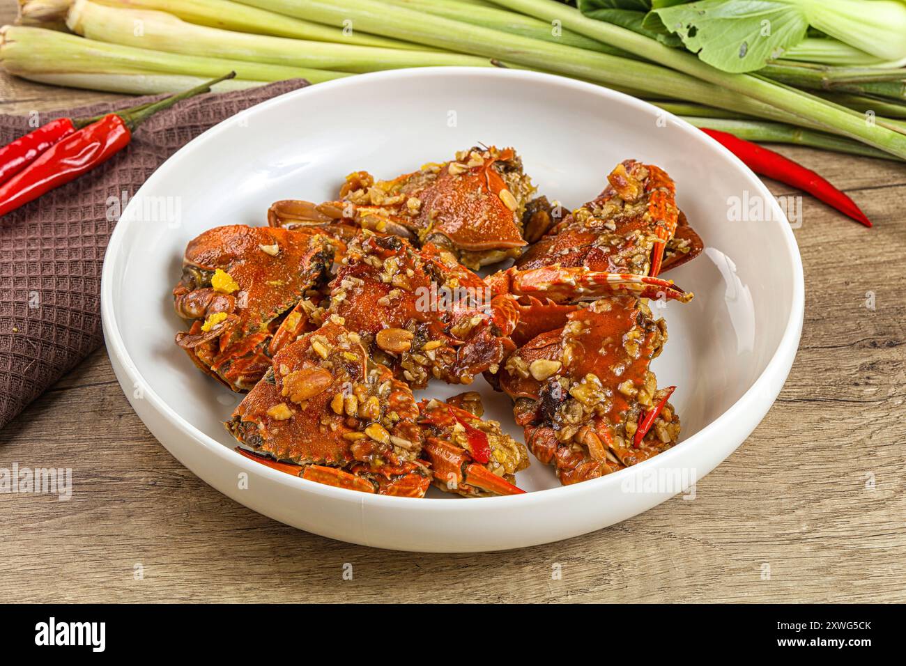 Tasty Steamed Spider crab Claws in tamatind sauce Stock Photo - Alamy