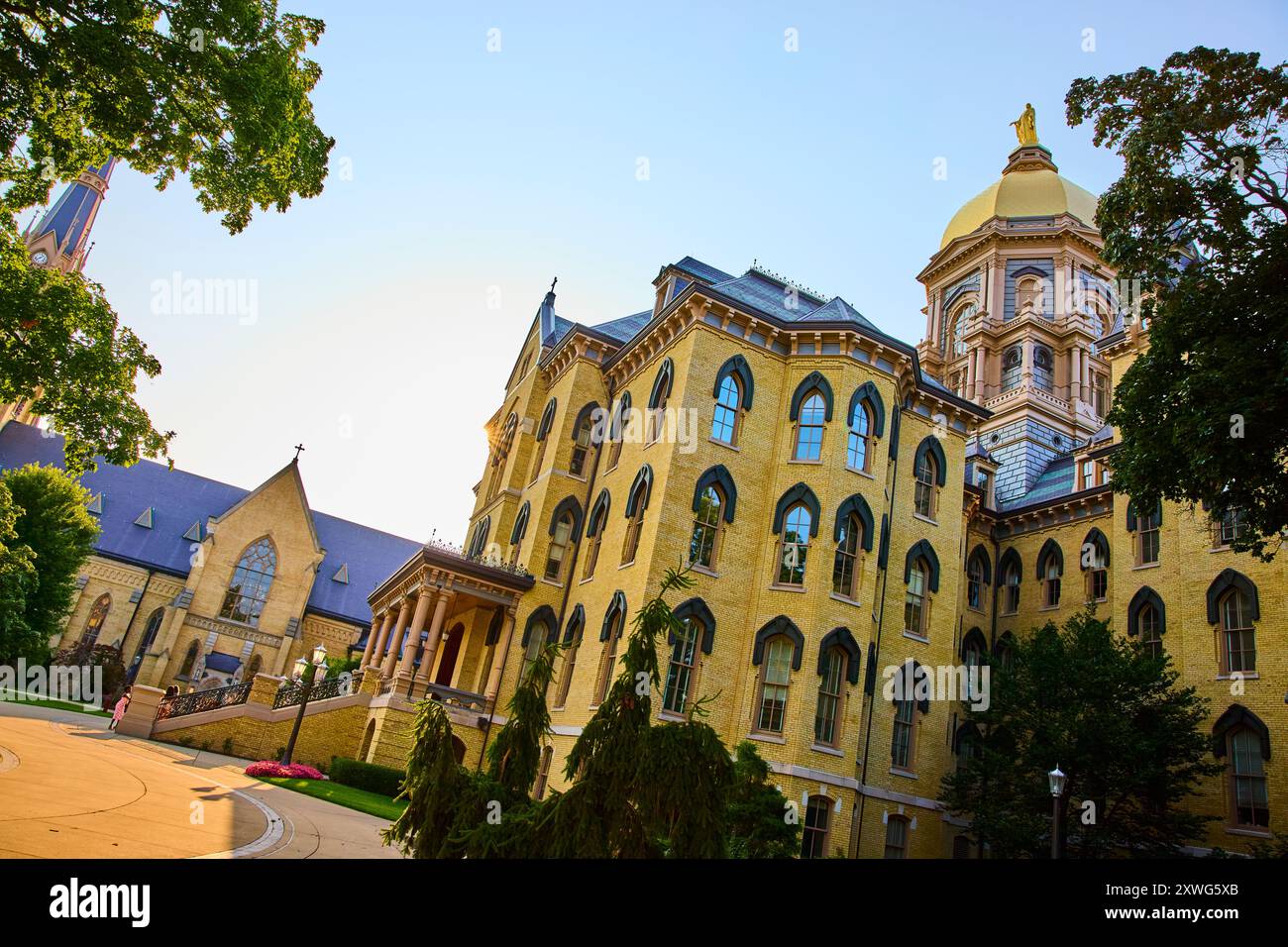 Historic University Building with Golden Dome at Golden Hour Ground ...