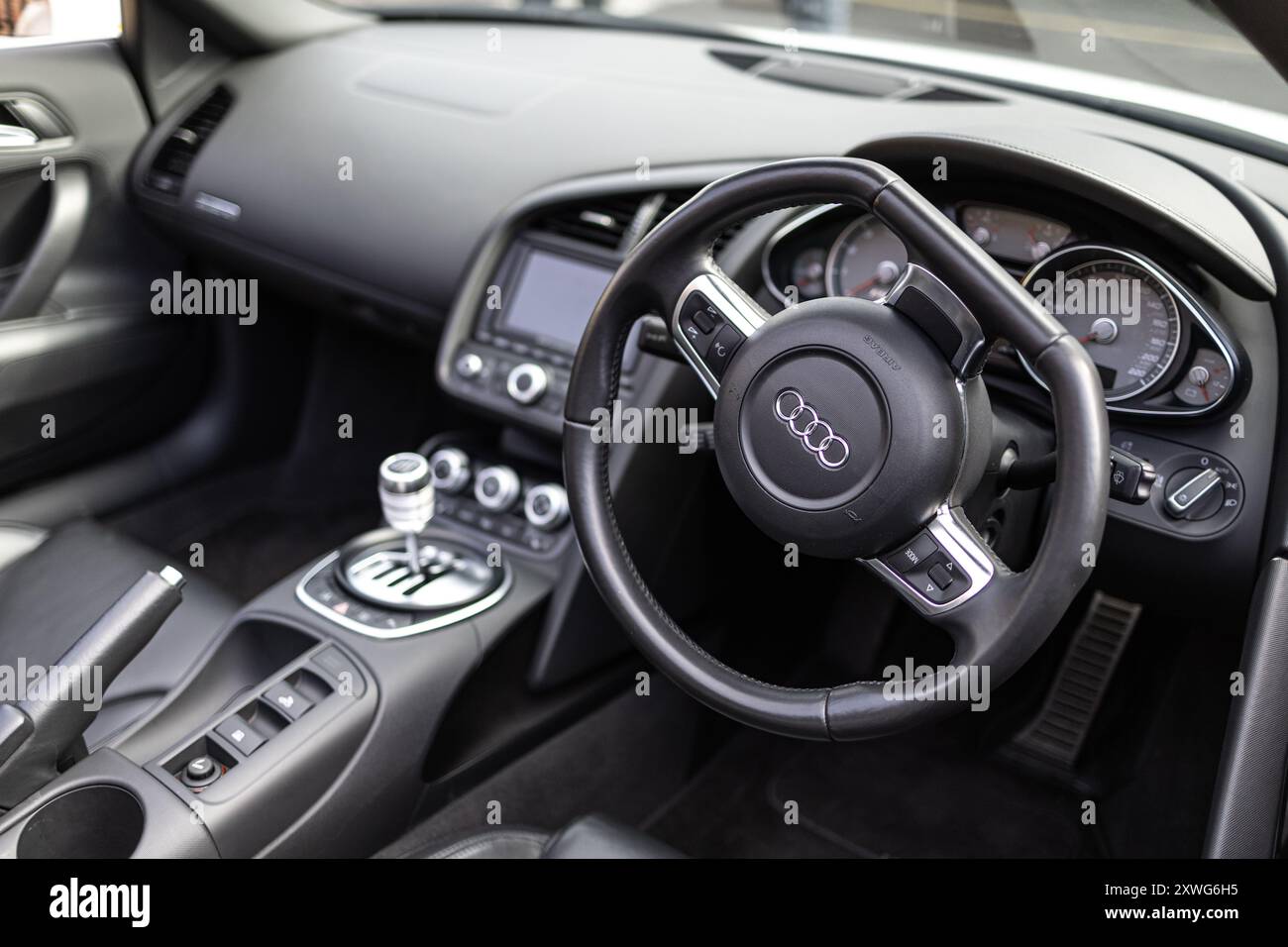Cardiff , UK - March 3, 2024: Audi R8 V8 Gauge cluster with focus on ...