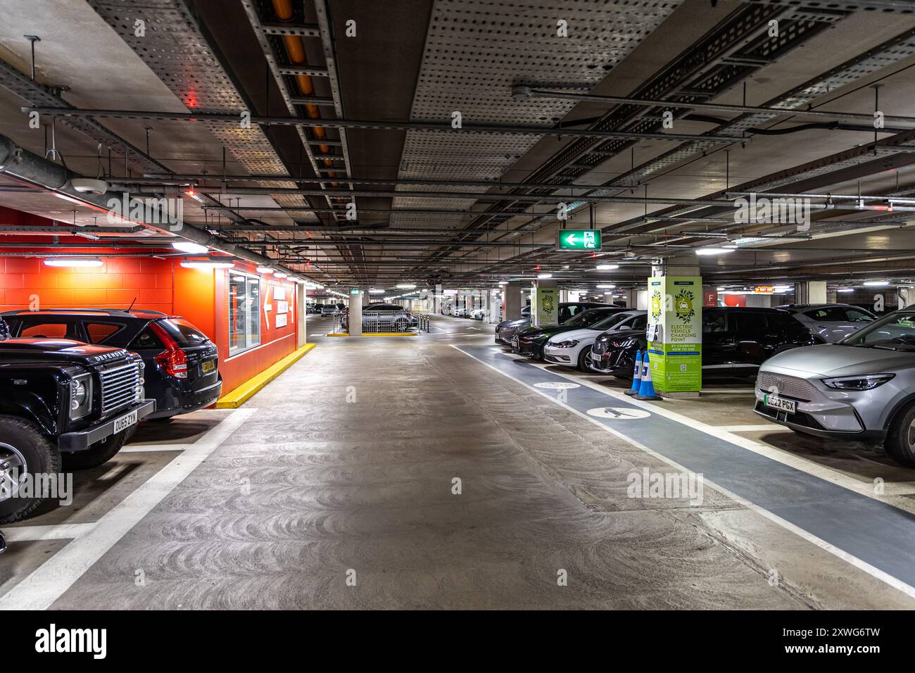 Oxford , UK - June 5, 2024: Underground car park full of cars with ...